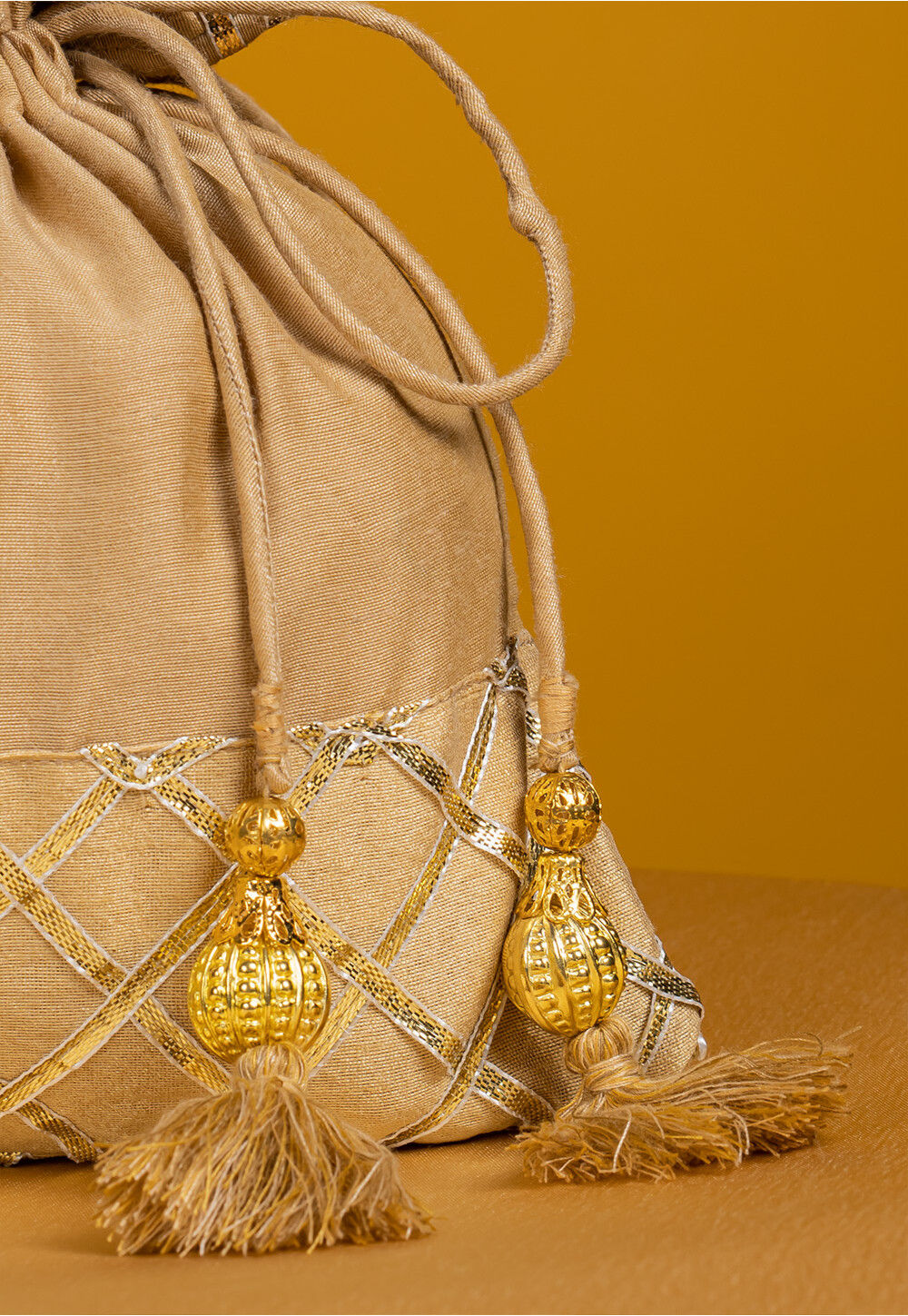 Embroidered Art Silk Potli Bag in Beige : DMQ260