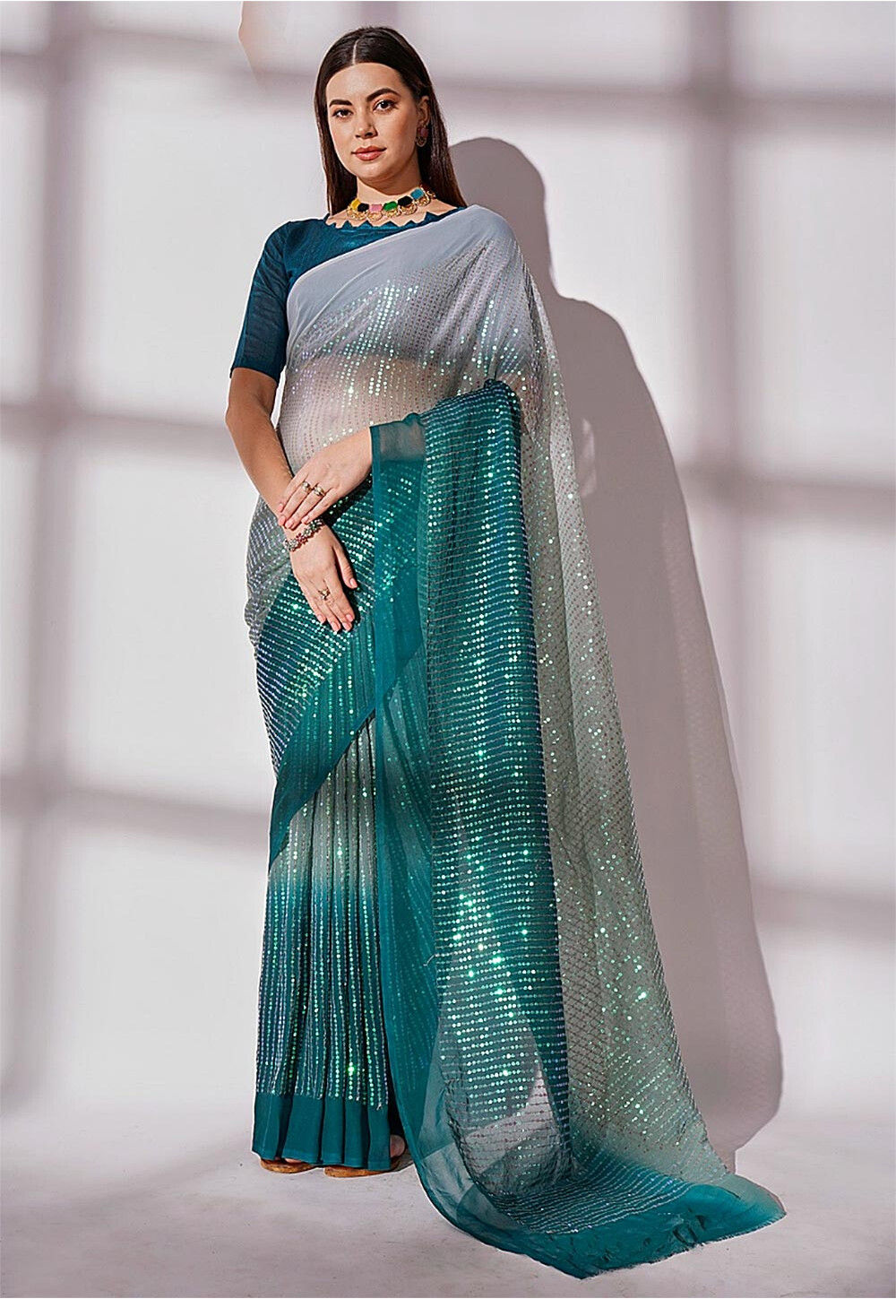 Buy Sequinned Georgette Saree in Shaded White and Teal Green Online ...