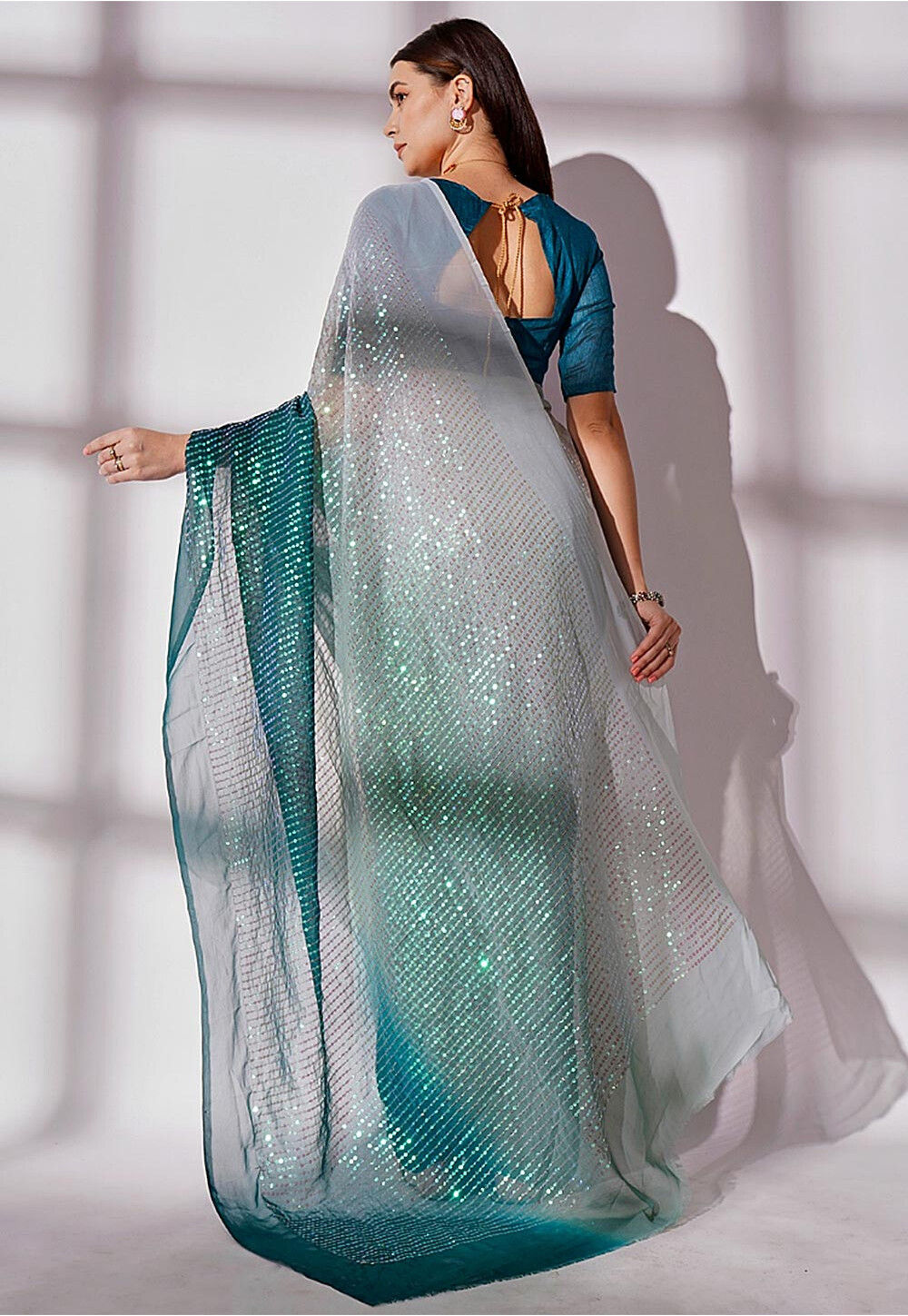 Buy Sequinned Georgette Saree in Shaded White and Teal Green Online ...